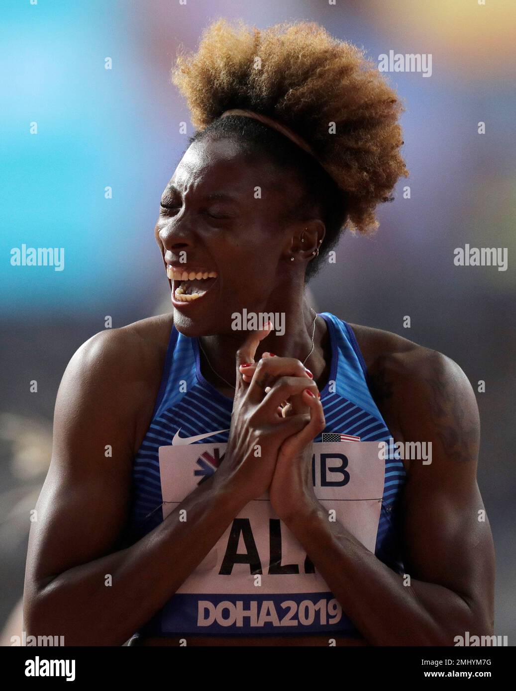 Nia Ali, of the United States celebrates winning the gold medal in the ...