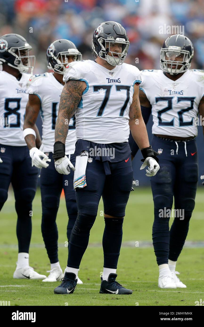 Tennessee Titans offensive tackle Taylor Lewan (77) lines up against ...