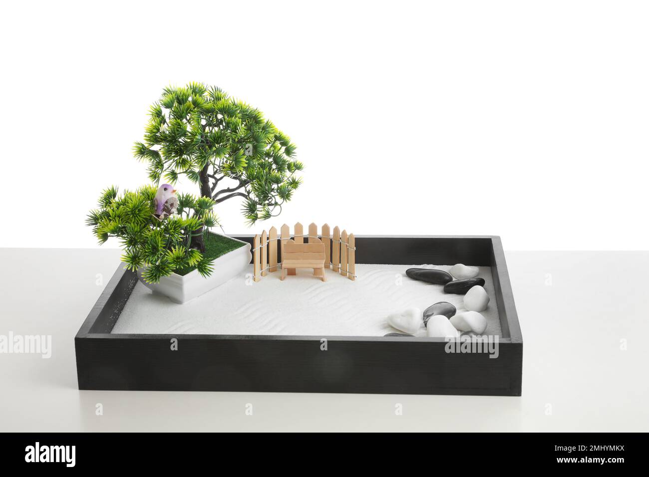 Beautiful miniature zen garden isolated on white Stock Photo - Alamy