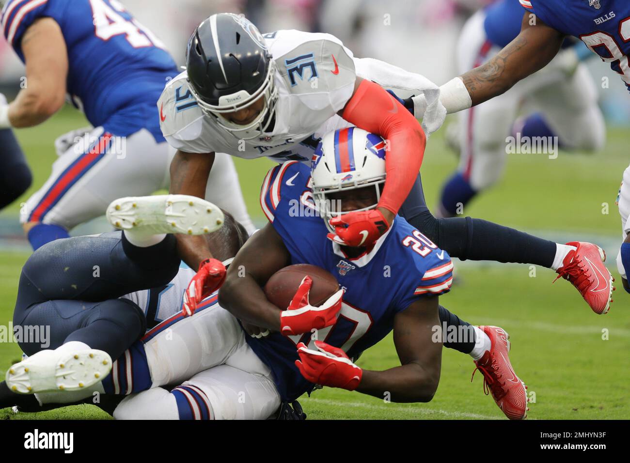 Buffalo Bills running back Frank Gore (20) is hit by Tennessee Titans ...