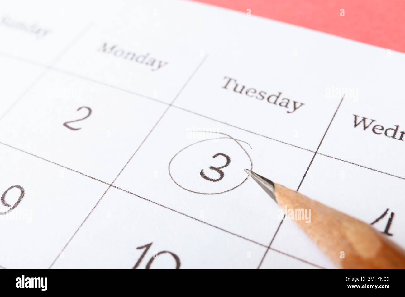 Pencil on calendar page with marked date, closeup Stock Photo - Alamy