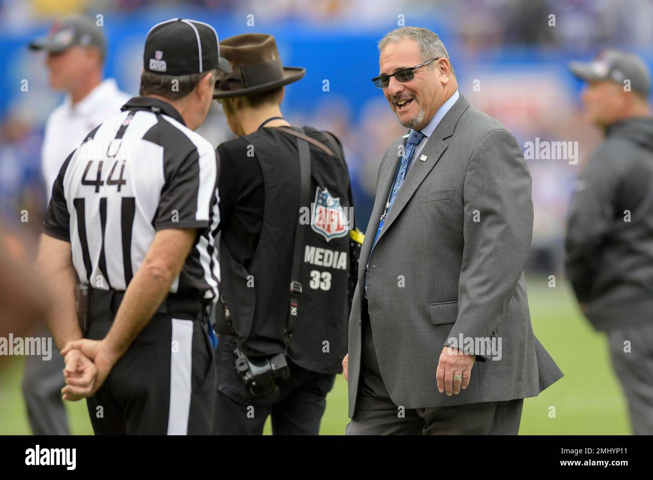 New York Giants general manager Dave Gettleman talks with an official ...