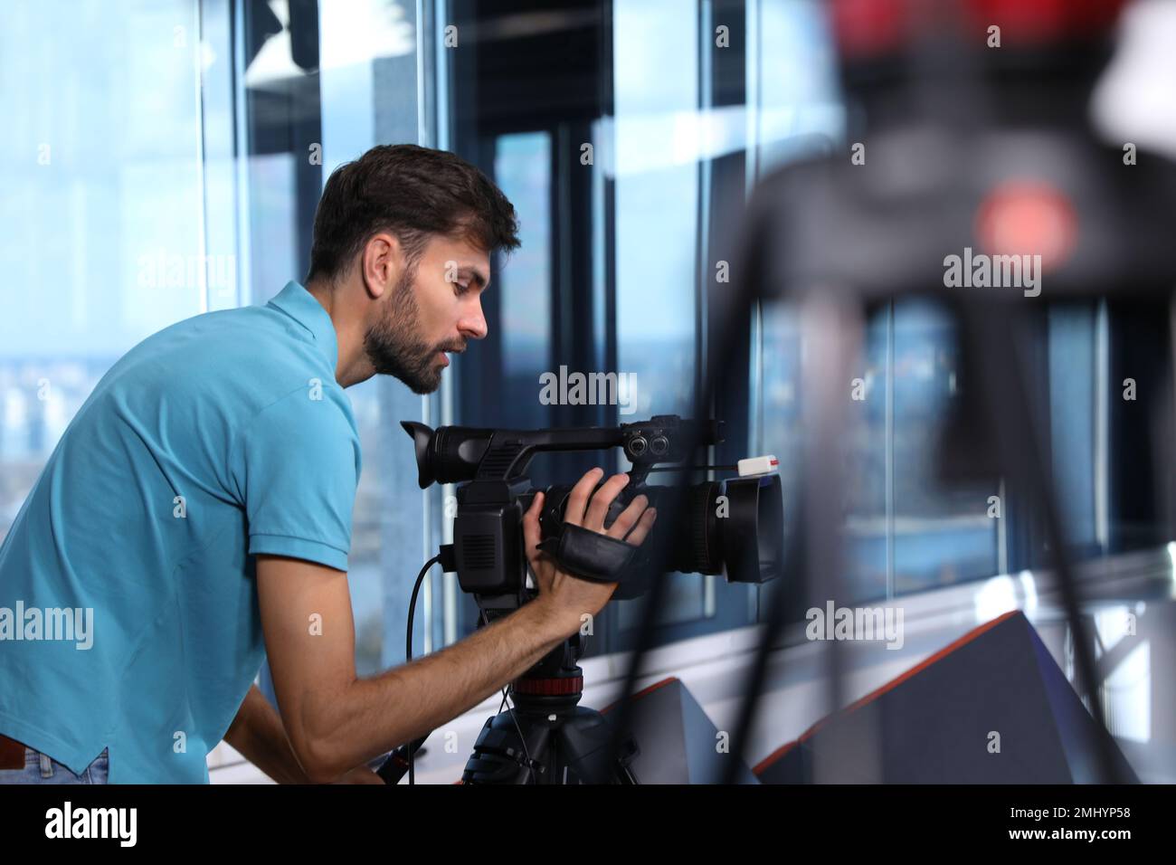Professional video camera operator hi-res stock photography and images ...