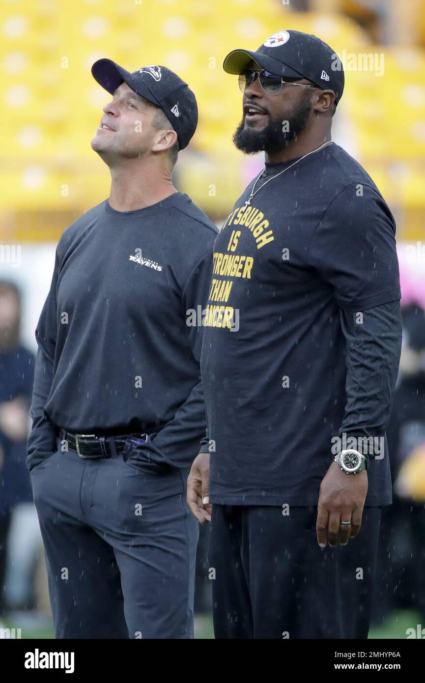 Pittsburgh Steelers head coach Mike Tomlin, right, and Baltimore Ravens head coach John Harbaugh ...