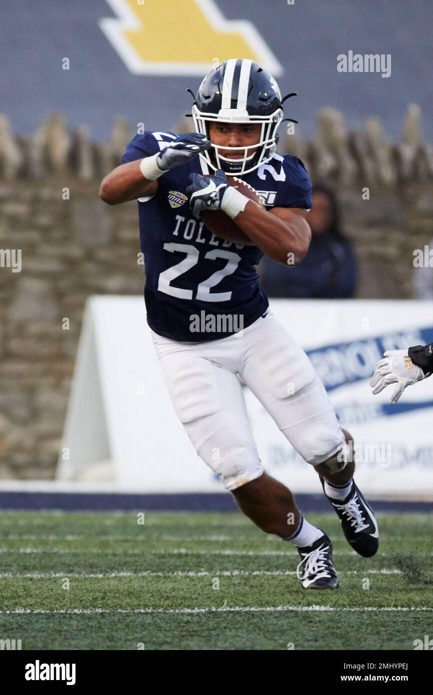 Toledo running back Bryant Koback (22) rushes against the Western ...