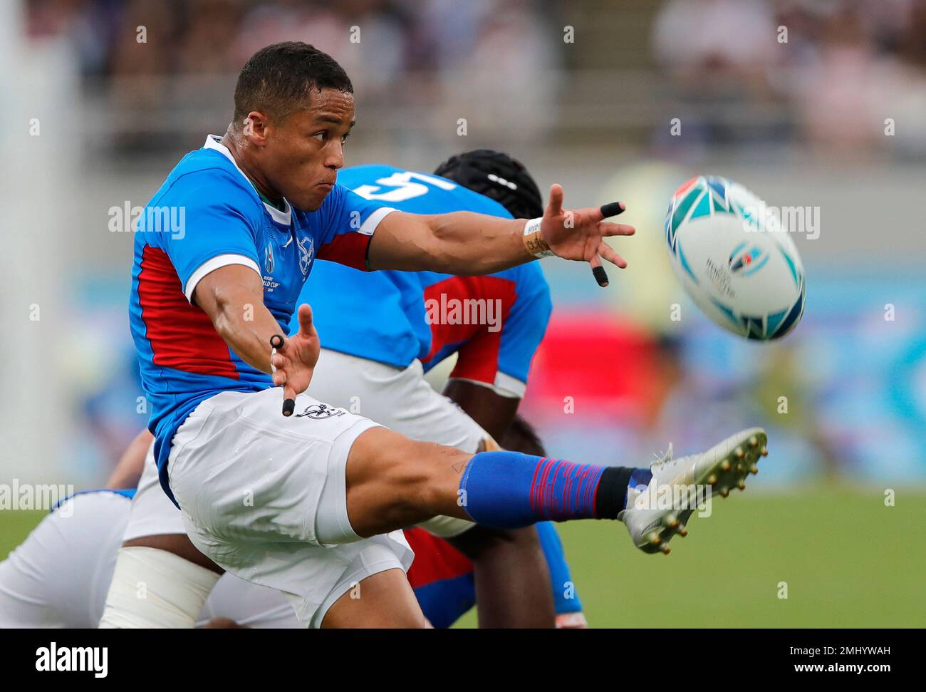 Namibia's Damian Stevens kicks the ball during the Rugby World Cup Pool ...