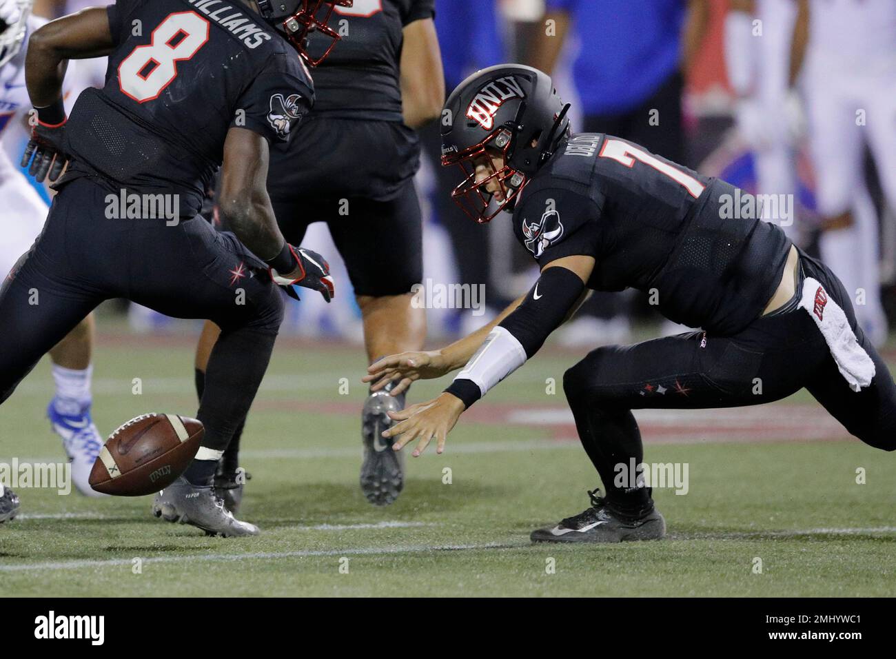 UNLV Rebels quarterback Kenyon Oblad tries to recover a fumble during ...
