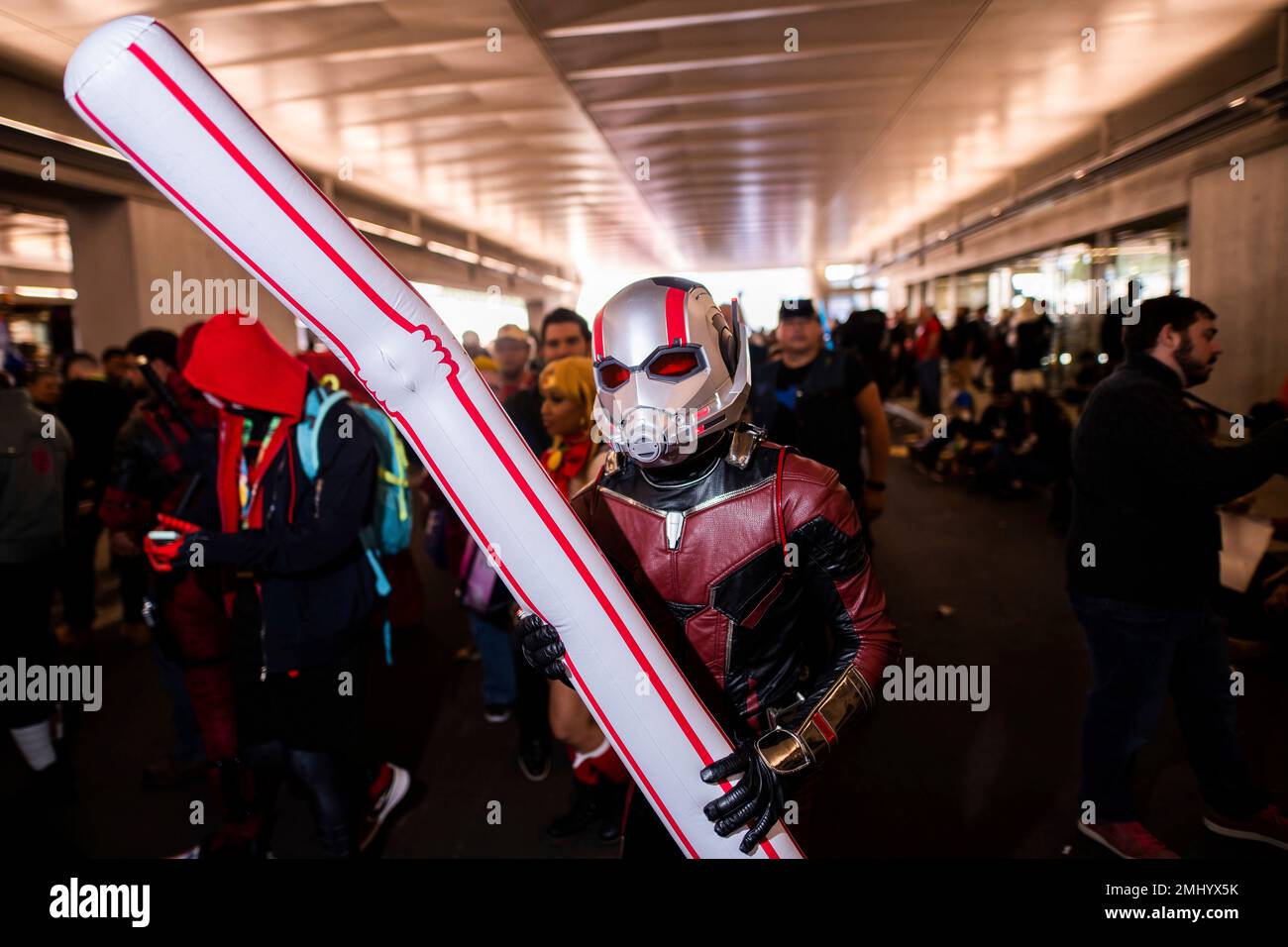 An attendee dressed as Ant-Man poses during New York Comic Con at the ...