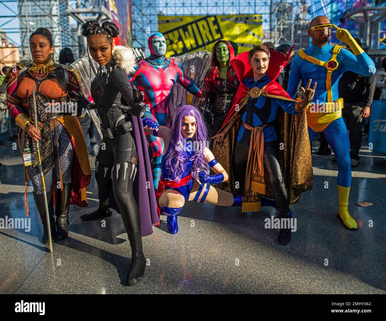 Costumed superheroes pose during New York Comic Con at the Jacob K ...