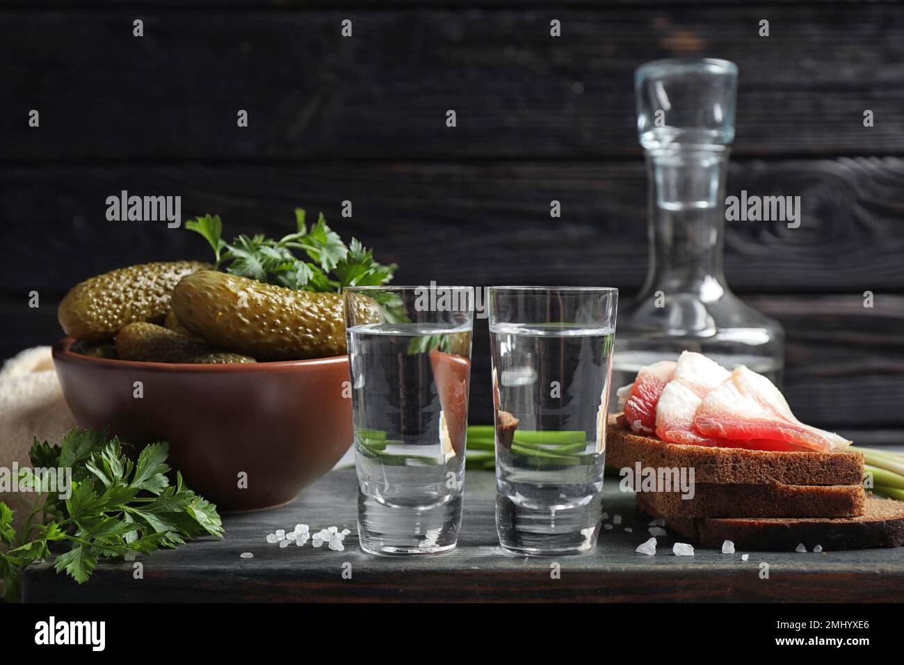 Cold Russian vodka with snacks on table Stock Photo - Alamy