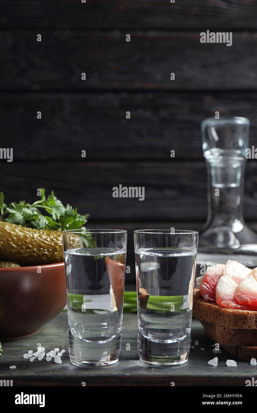 Cold Russian vodka with snacks on table Stock Photo - Alamy