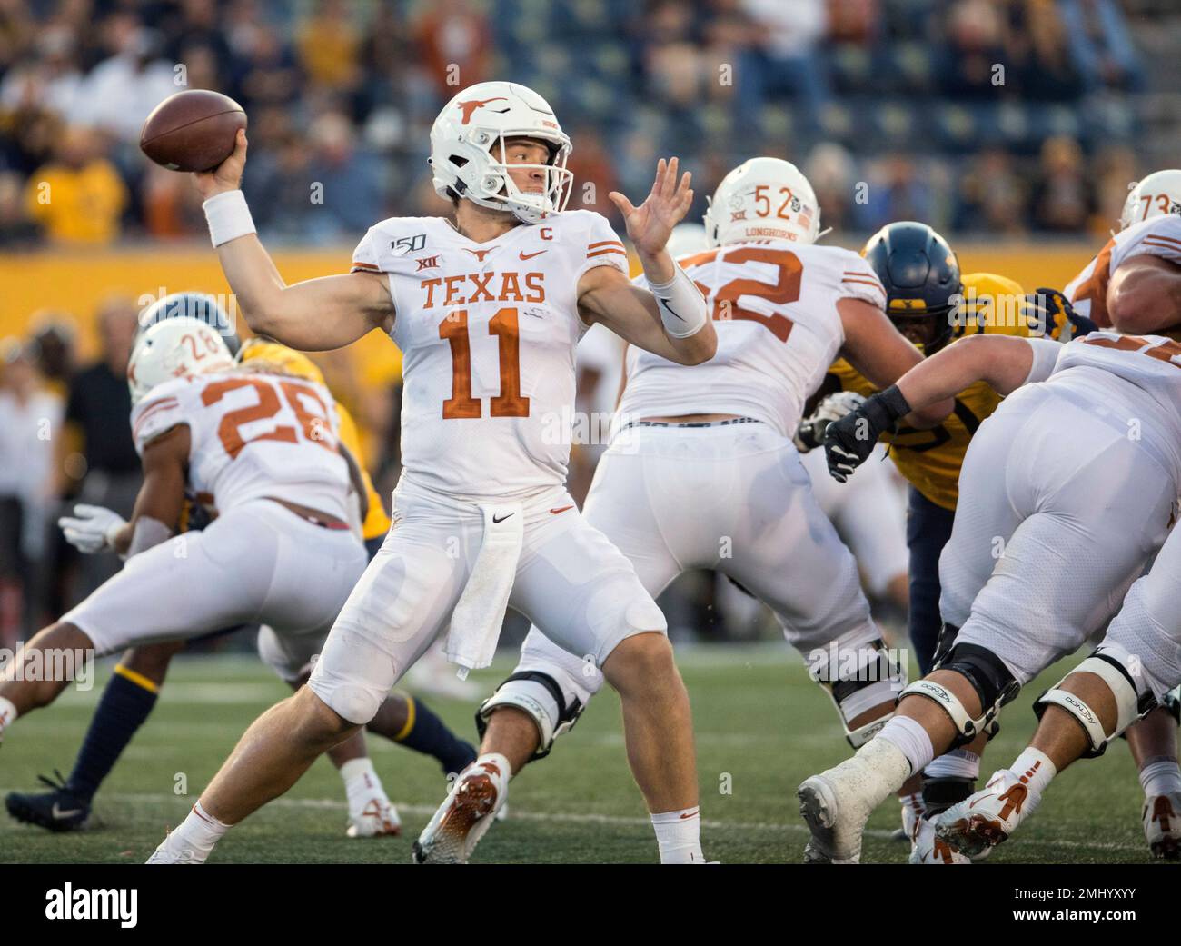 Texas quarterback Sam Ehlinger (11) attempts a pass during the second ...