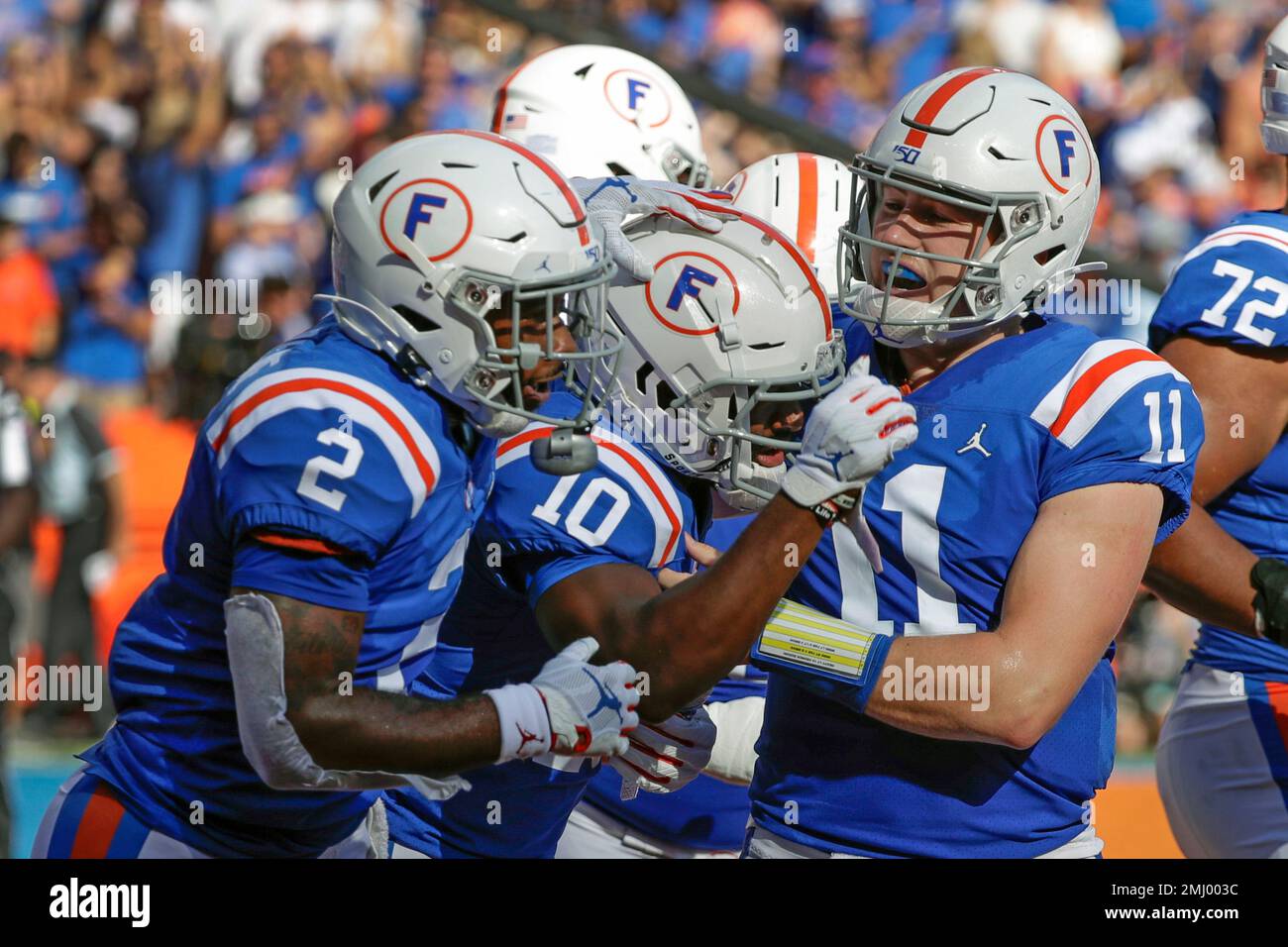 Florida wide receiver Josh Hammond (10) celebrates with running back ...