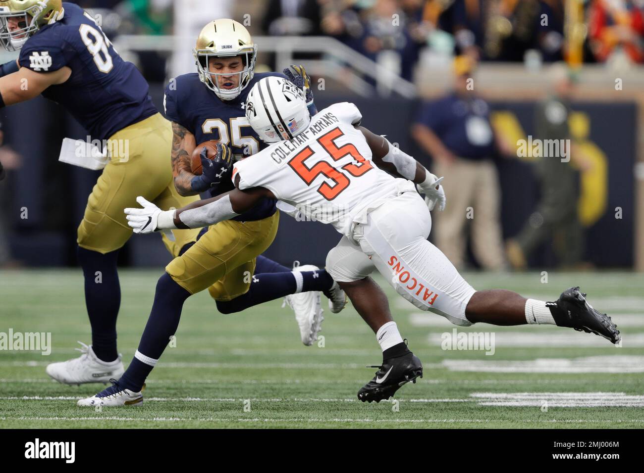 Notre Dame wide receiver Braden Lenzy (25) is tackled by Bowling Green ...