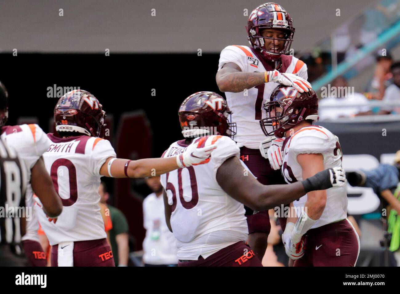 Virginia tight end Dalton Keene, right, celebrates with wide receiver ...