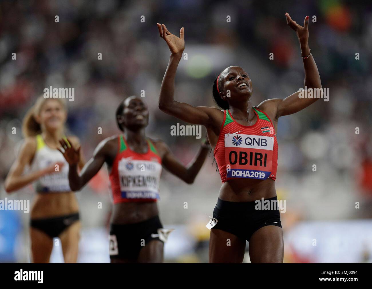 Hellen Obiri of Kenya celebrates after winning the gold medal in the ...