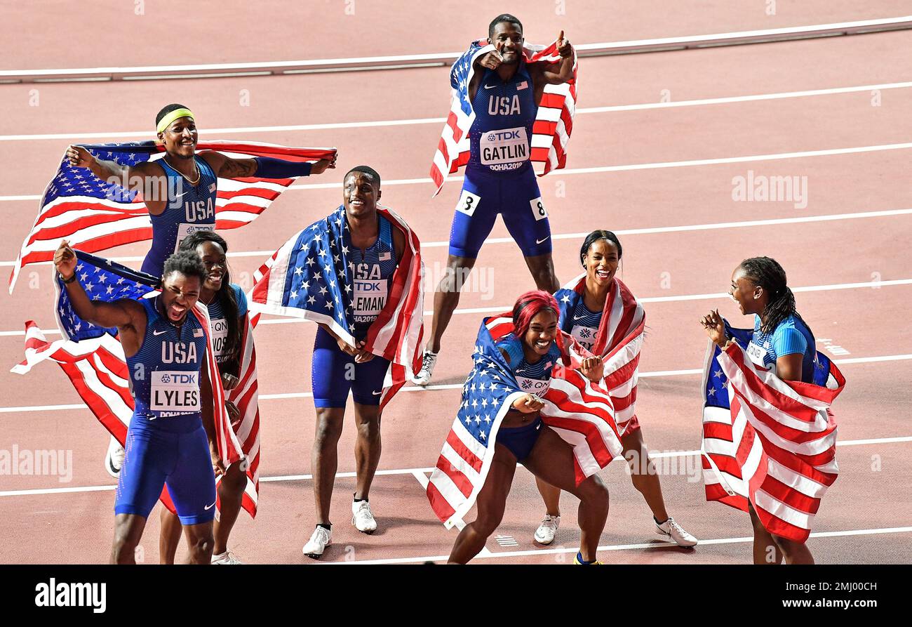The United States men's and women's 4x100 meter relay teams celebrate ...
