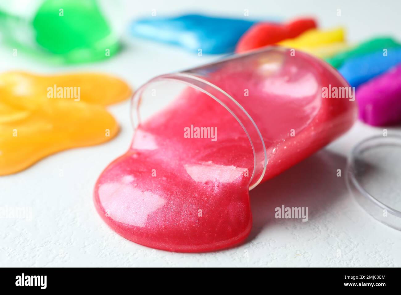 Different bright slimes on white background, closeup Stock Photo - Alamy