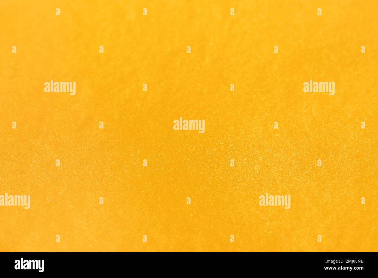 Closeup view of yellow slime as background. Antistress toy Stock Photo ...