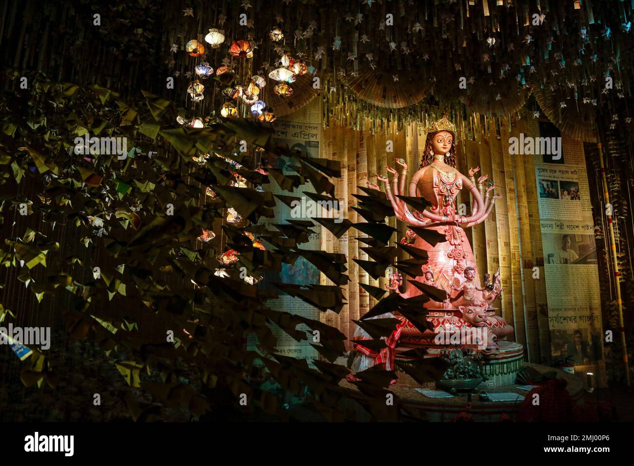 An image of Hindu goddess Durga decorated with paper and paper pulps ...