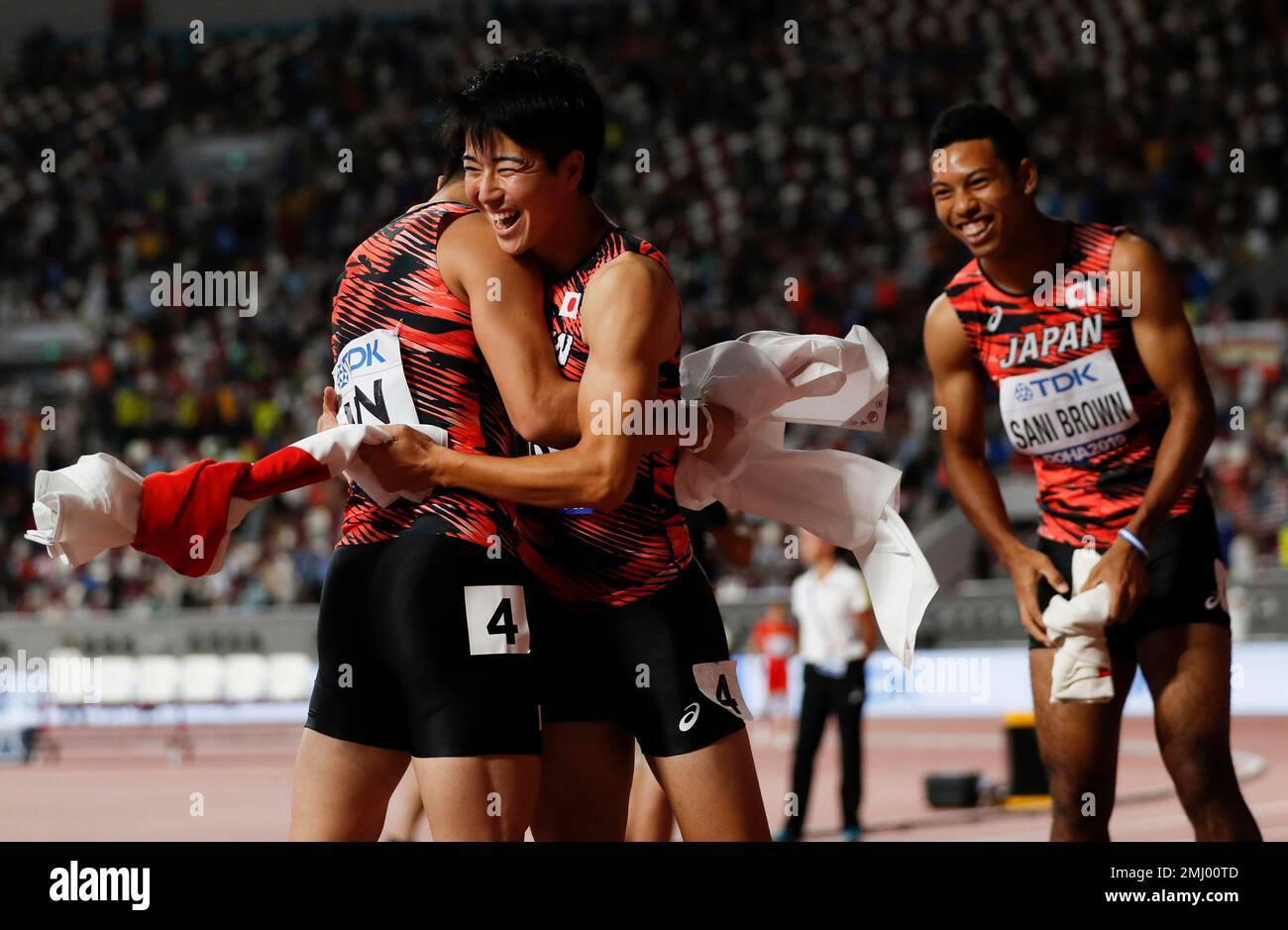 The Japanese team celebrate their bronze medal in the men's 4x100 meter ...
