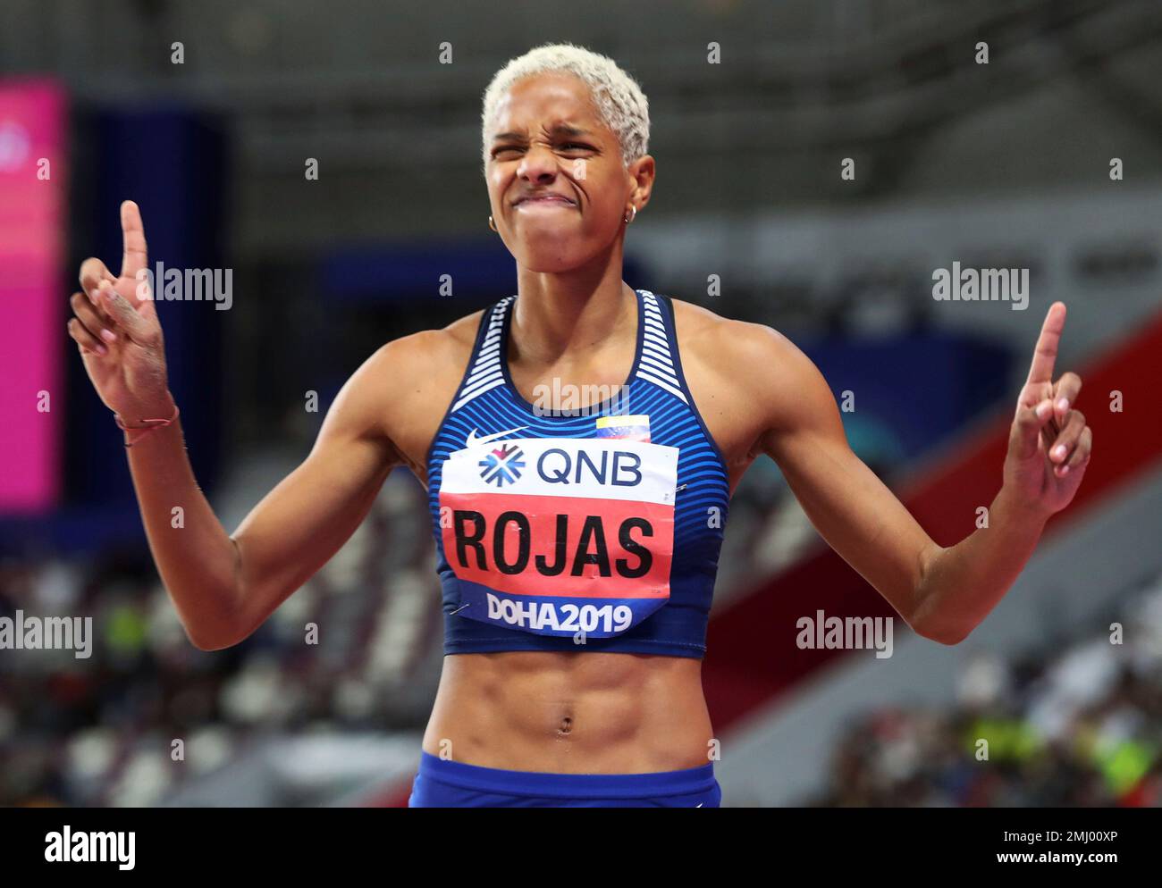 Yulimar Rojas, of Venezuela, grimaces after a jump while competing in ...