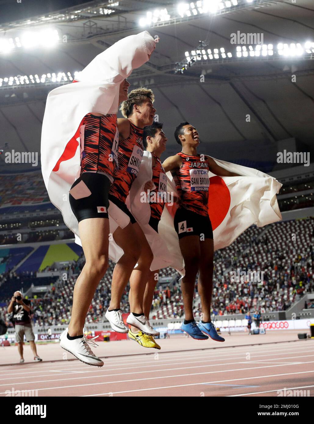 The Japanese team celebrate their bronze medals in the men's 4x100 ...