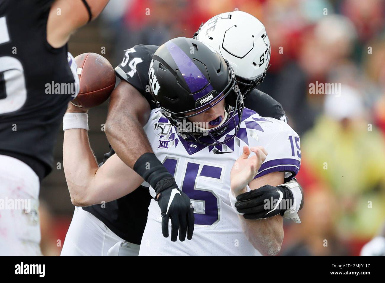 TCU quarterback Max Duggan fumbles as he is hit by Iowa State ...