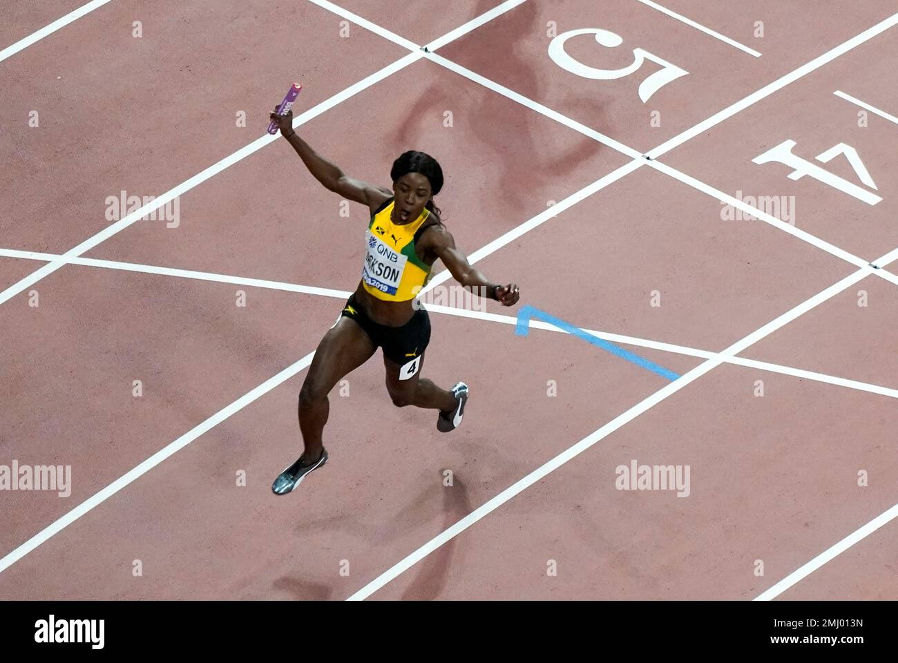 Shericka Jackson of Jamaica crosses the finish line to win the women's ...