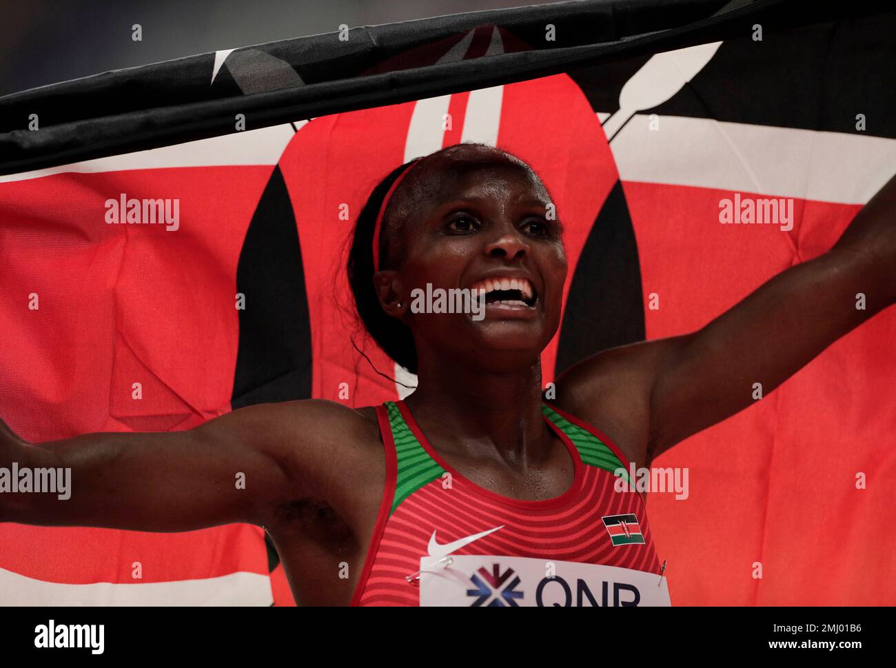 Hellen Obiri of Kenya celebrates after winning the gold medal in the ...