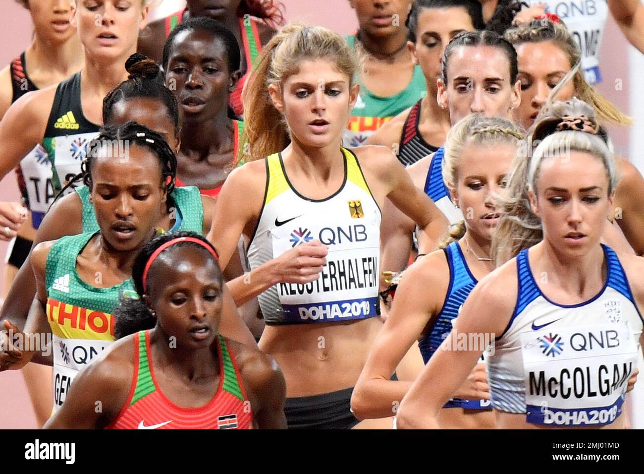 Konstanze Klosterhalfen, of Germany, center, competes in the women's ...