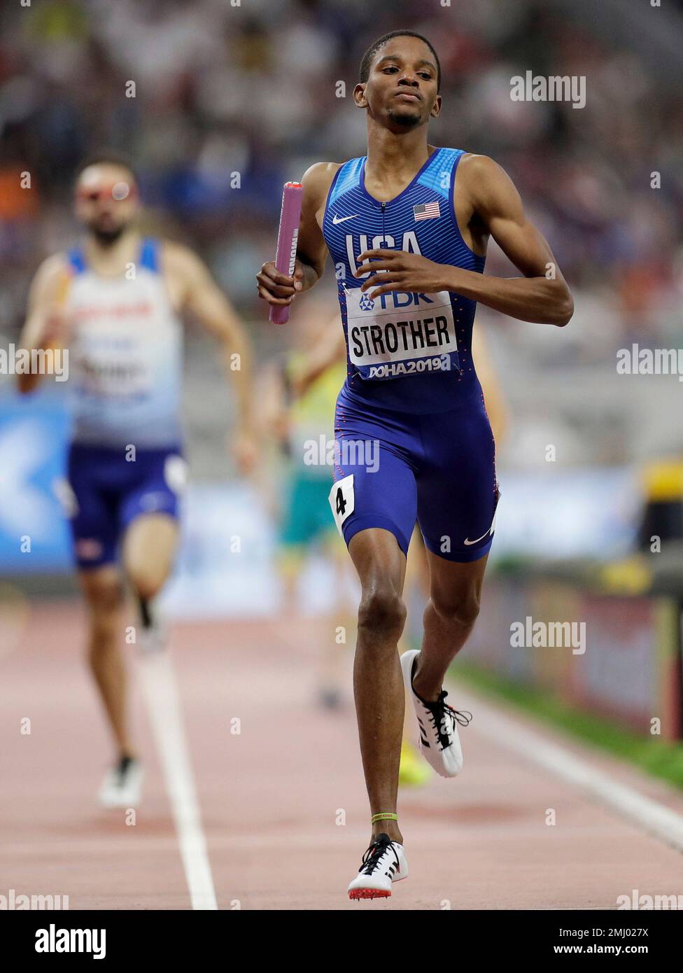 Nathan Strother of the United States races to the line to win a men's ...