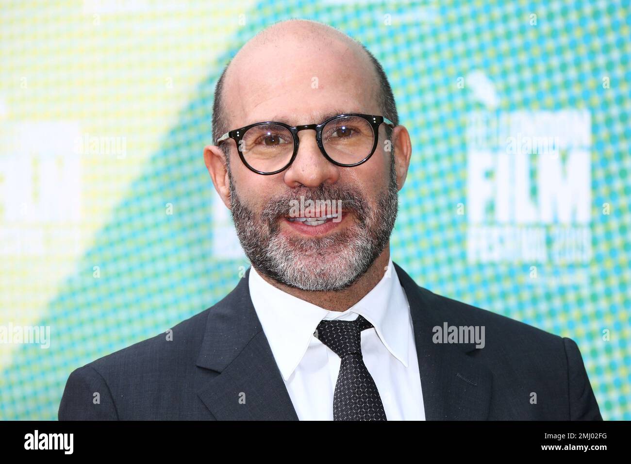 Director Scott Z. Burns poses for photographers upon arrival at the premiere of the film 'The ...