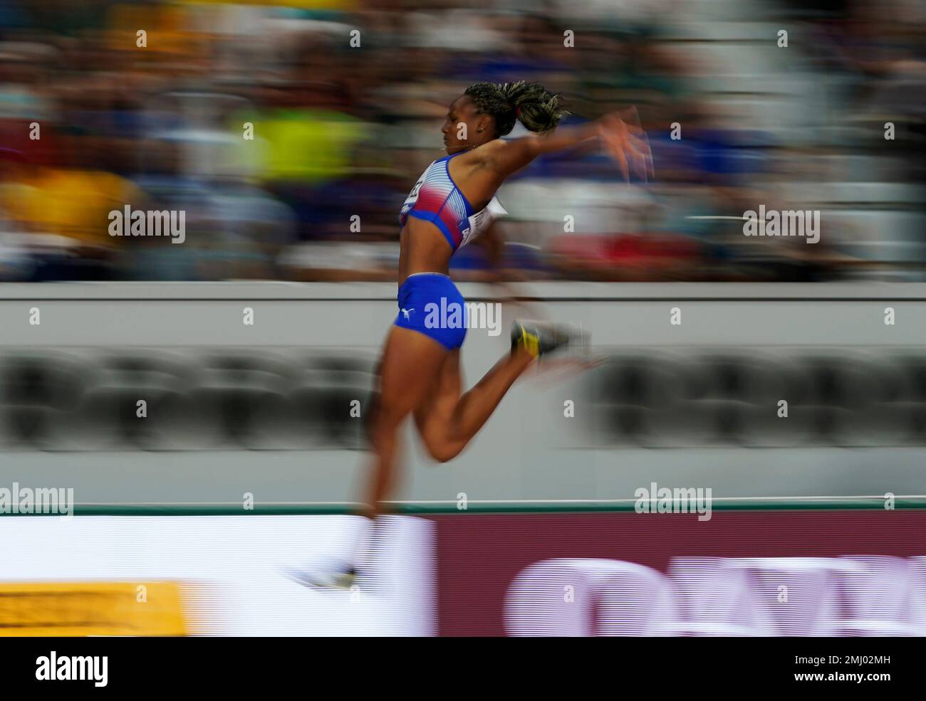 Adriana Rodríguez, of Cuba, competes in the women's long jump ...
