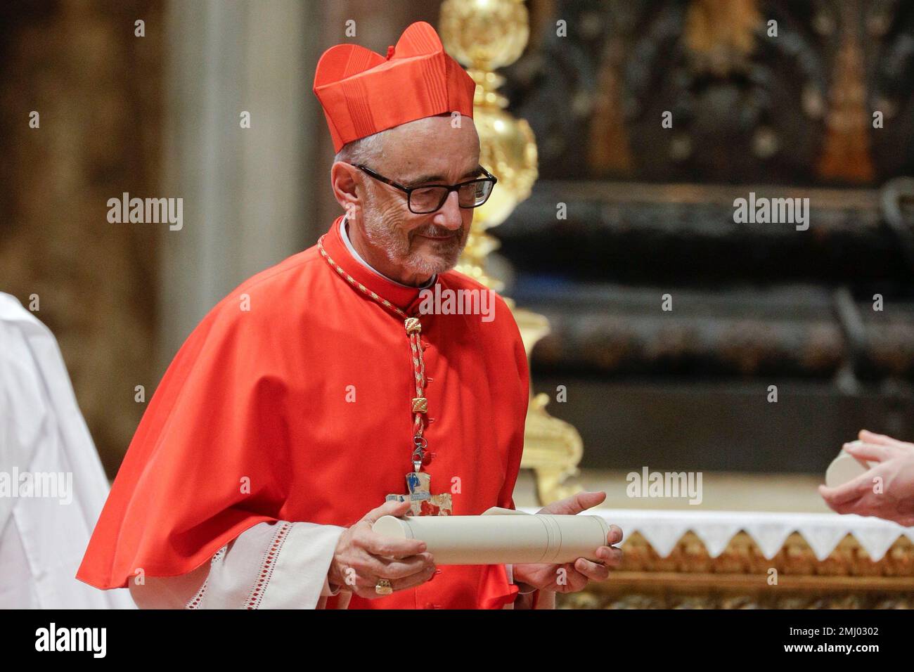 Cardinal Michael Czerny walks after being elevated during a consistory ...