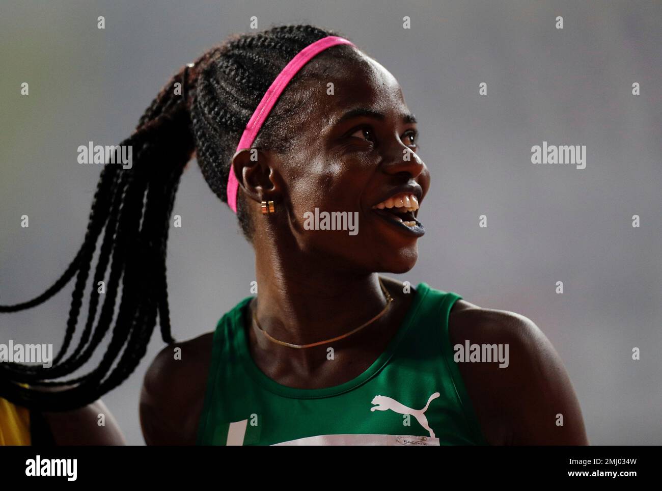 Tobi Amusan of Nigeria smiles after finishing a women's 100 meter ...