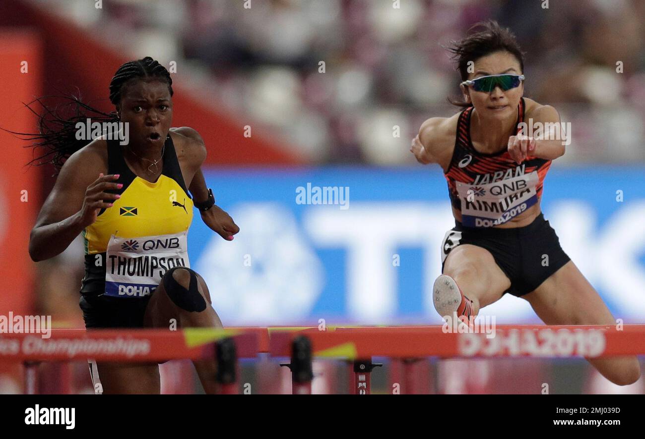 Ayako Kimura of Japan, right, and Yanique Thompson, of Jamaica compete ...