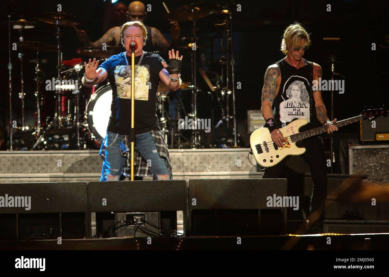 Guns N' Roses' Axl Rose, left, and bassist Duff McKagan perform on the ...