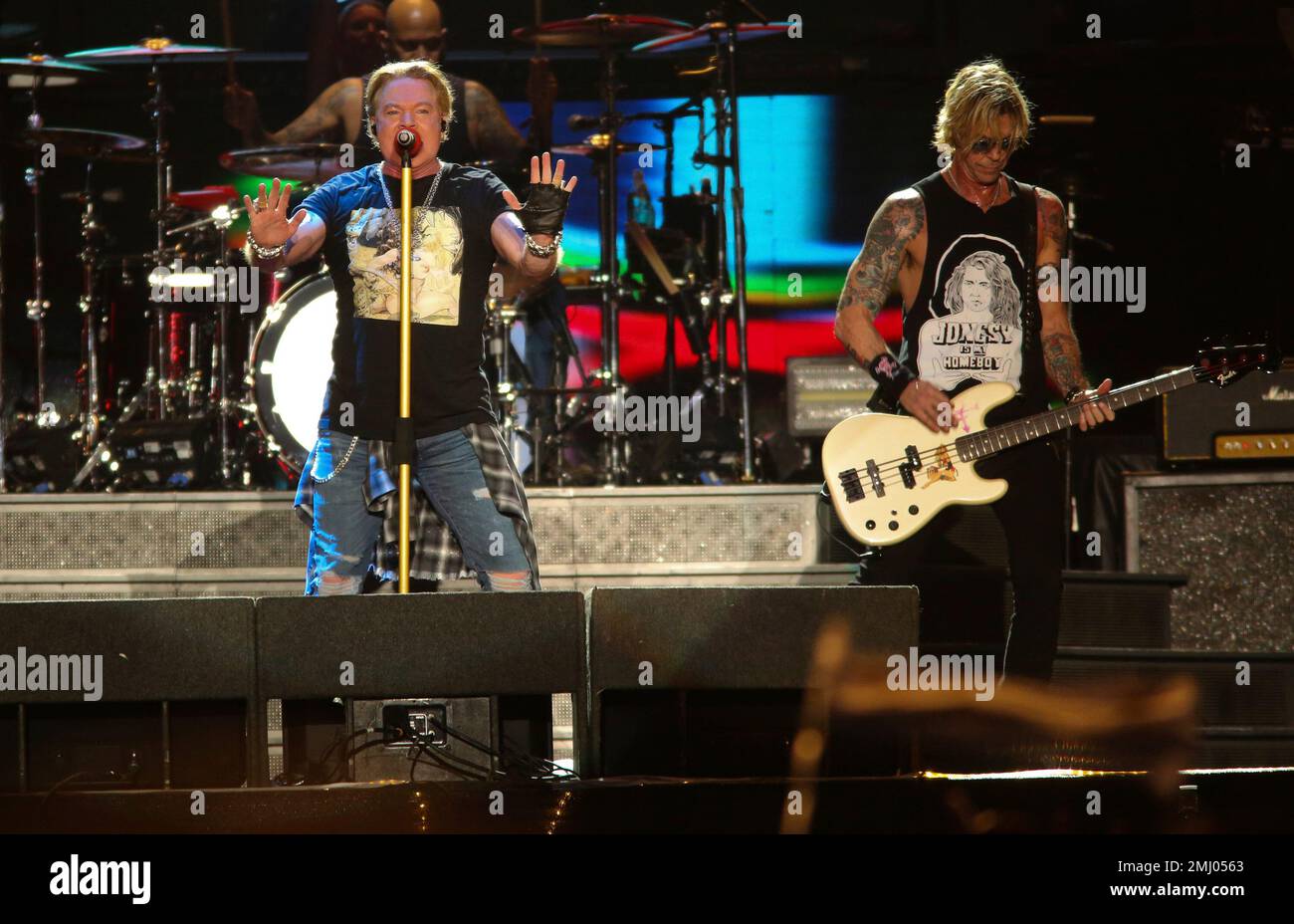 Guns N' Roses' Axl Rose, left, and bassist Duff McKagan perform on the ...