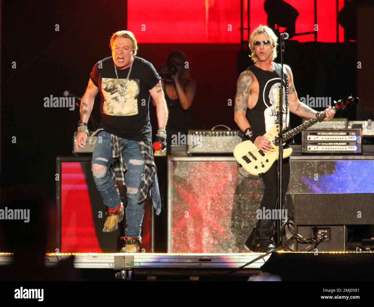 Guns N' Roses' Axl Rose, left, and bassist Duff McKagan perform on the ...