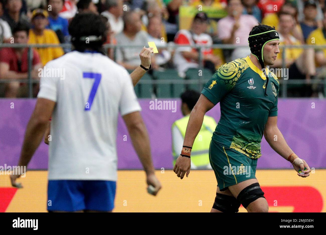 Australia's Adam Coleman is shown a yellow card for a high tackle ...