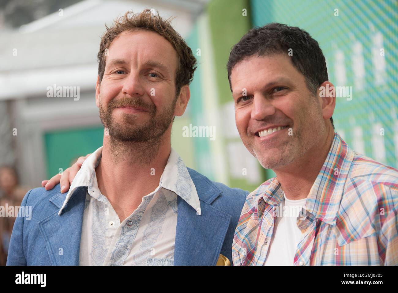 Tyler Nilson, left and Michael Schwartz pose for photographers upon ...