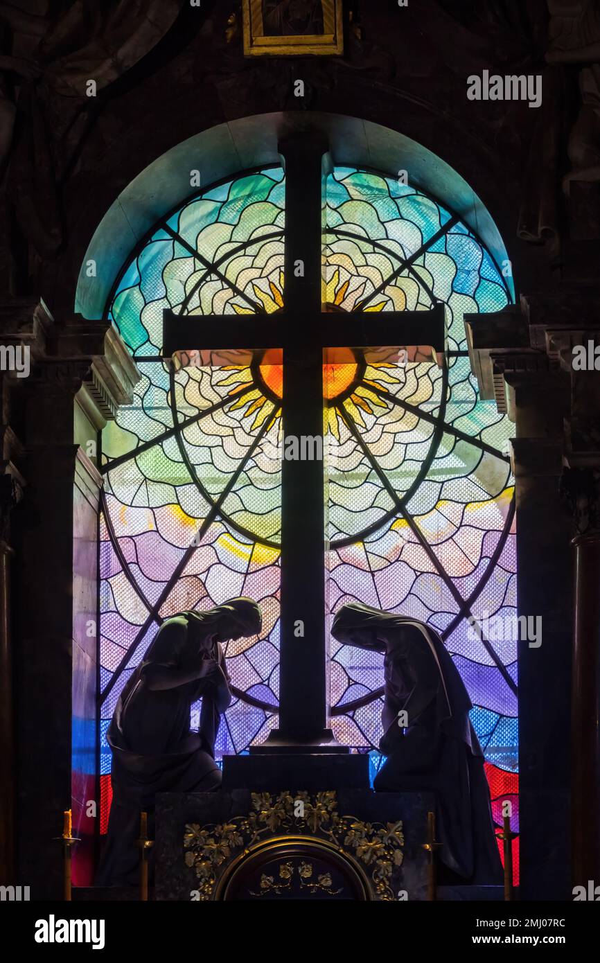 Stained glass window and sculpture inside the Cathedral Basilica of the ...