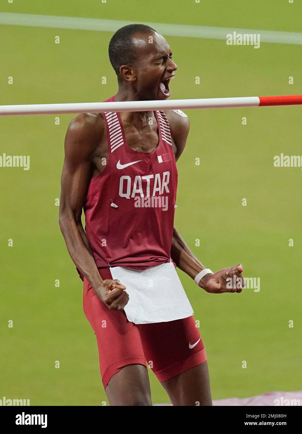 Mutaz Essa Barshim, of Qatar, celebrates after a jump during the men's ...