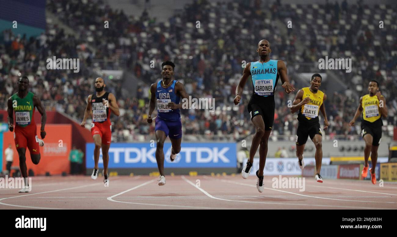 Steven Gardiner of Bahamas, front center, wins the gold medal in the ...