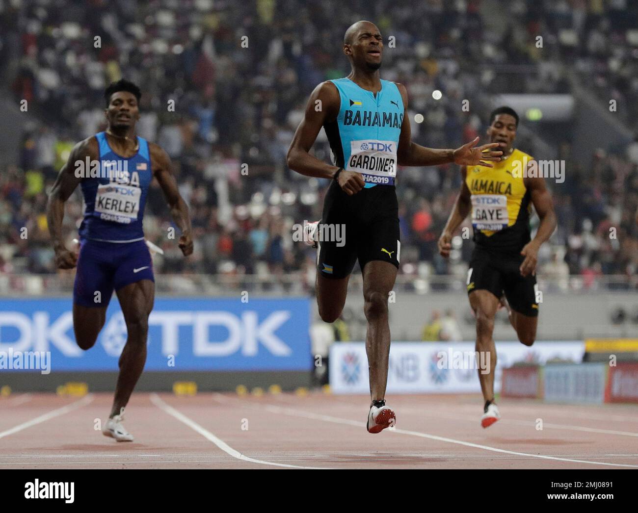 Steven Gardiner of Bahamas, center, wins the gold medal in the men's ...