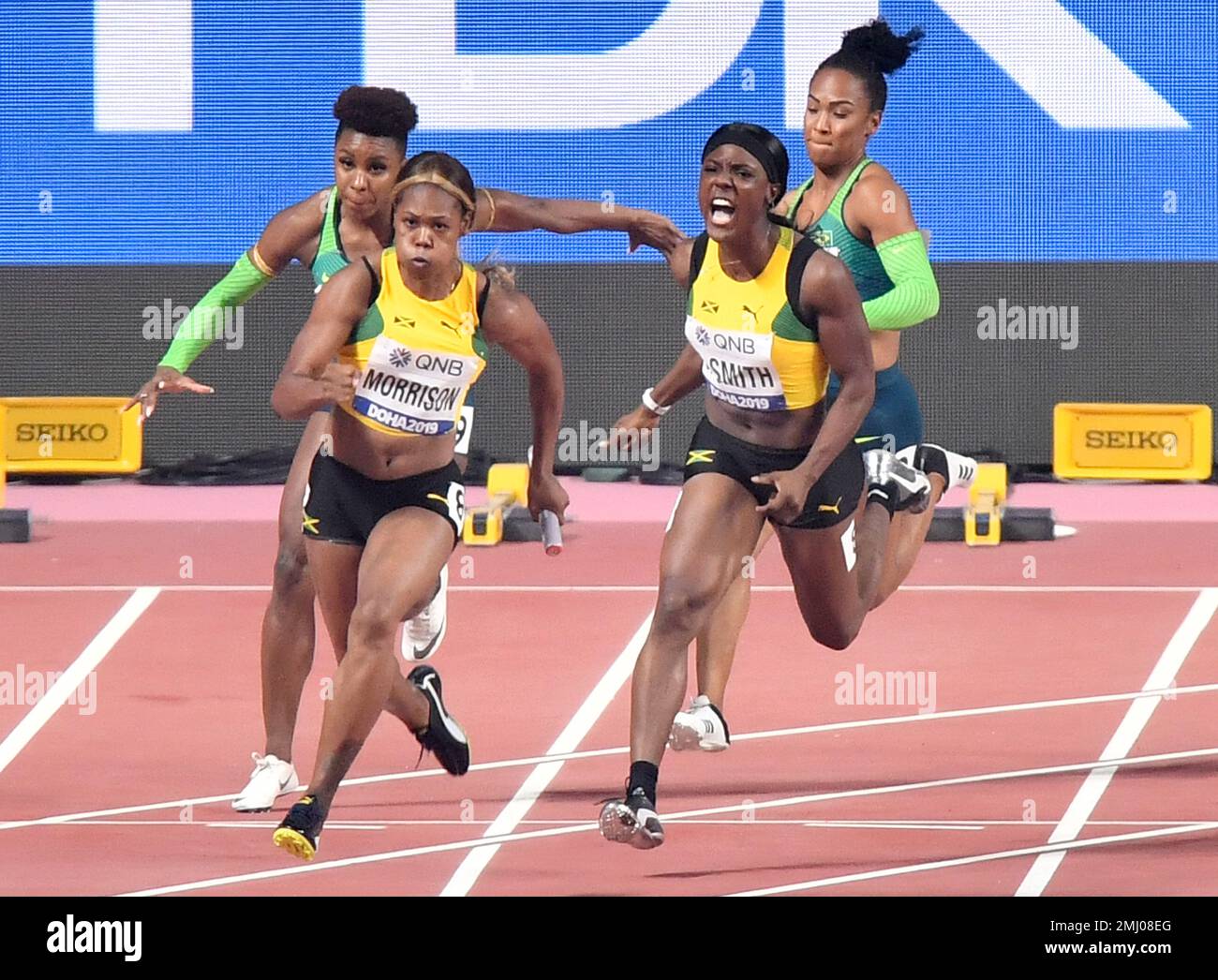 Jamaica's Jonielle Smith, right, screams to encourage teammate Natasha ...