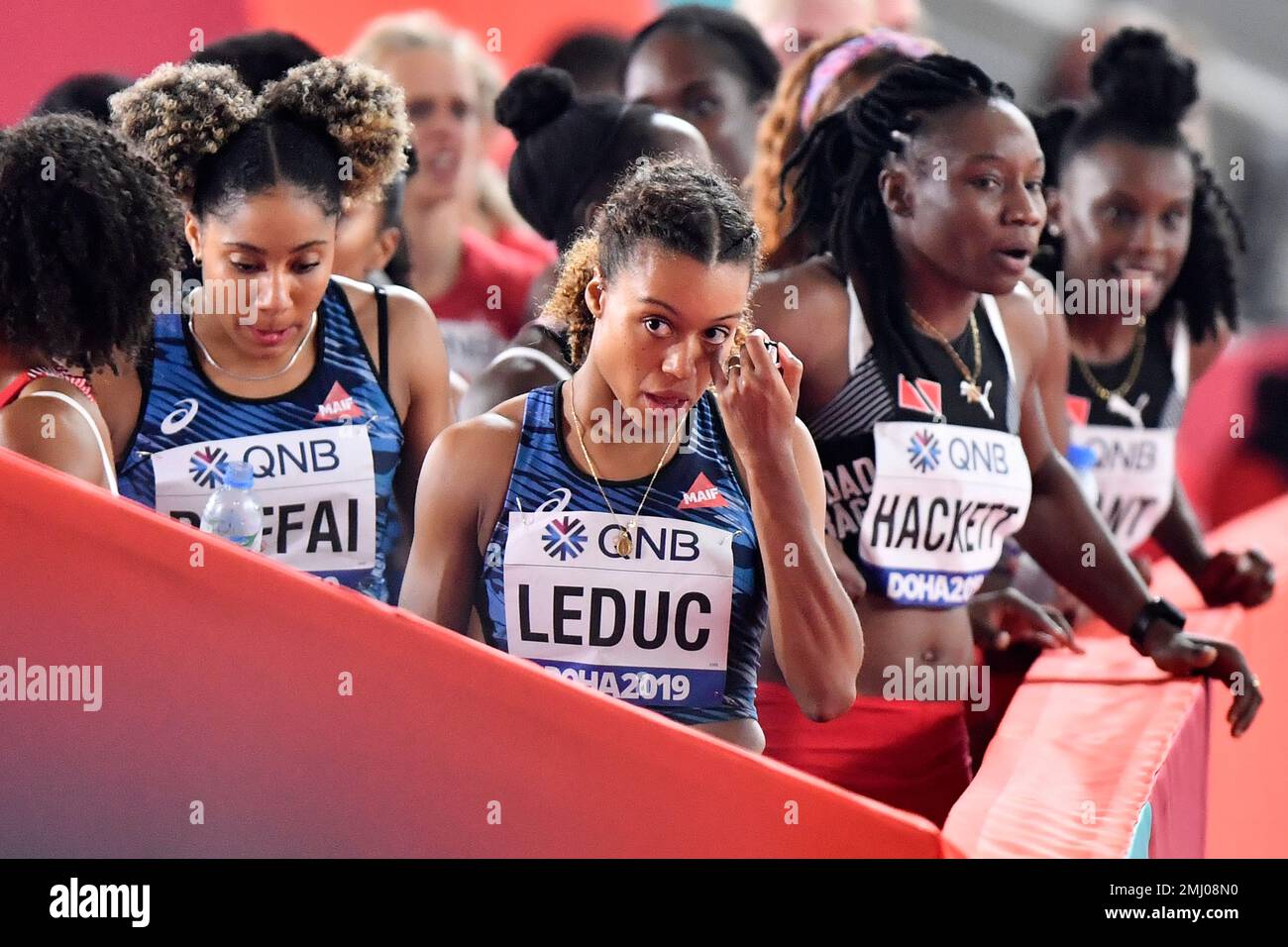 France's Cynthia Leduc, center, and Estelle Raffai, left, leave after ...