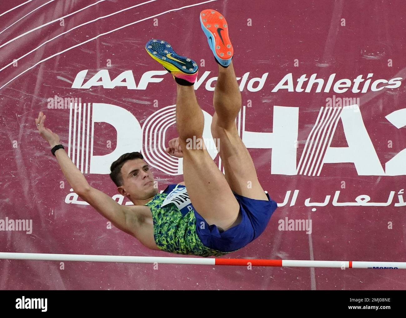Ilya Ivanyuk, of participates as a neutral athlete, clears the bar ...