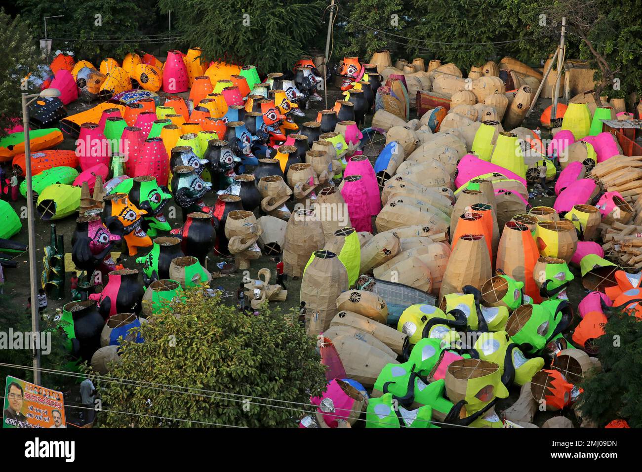 Effigies of mythical demon king Ravana are seen prepared in a park ...